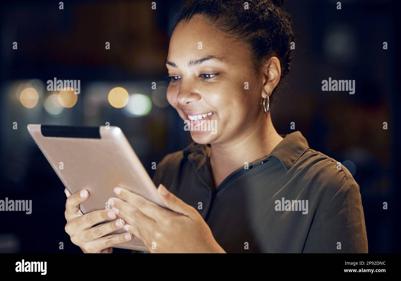 Tablet, night and business woman reading online data analysis, feedback ...