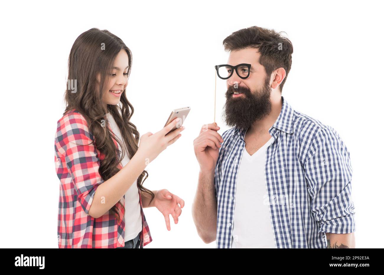 Happy father look through paper glasses at child daughter using ...
