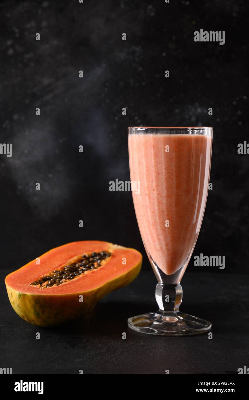 Asian Papaya lassi on black background. Freshness cold beverage of ...