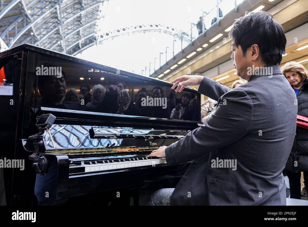 Pianist Lang Lang performs on a public piano at St Pancras Station in ...
