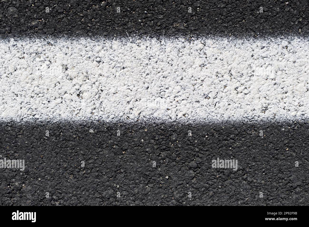Close-up texture of the asphalt of a road with a white line Stock Photo ...