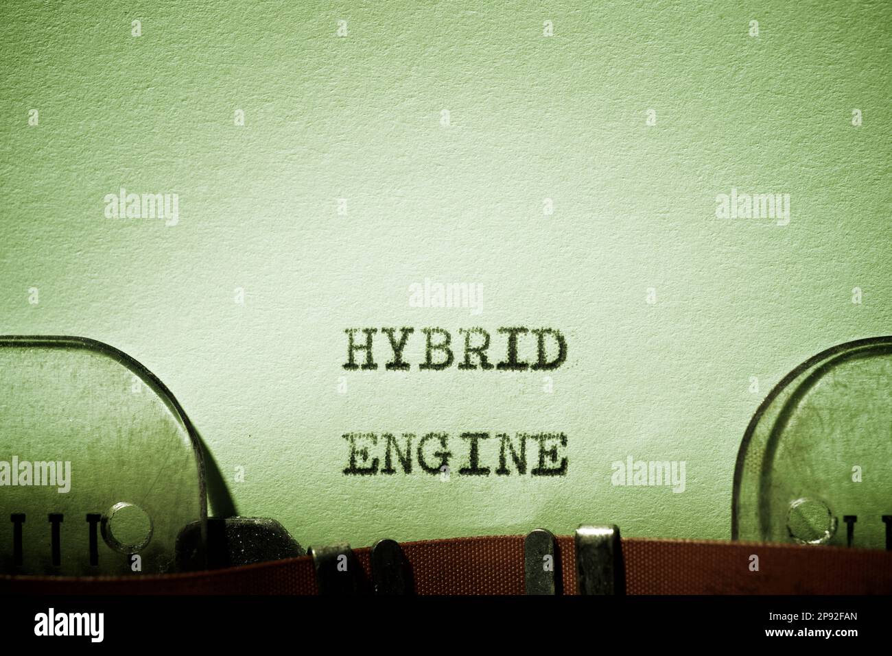 Hybrid engine text written with a typewriter Stock Photo - Alamy