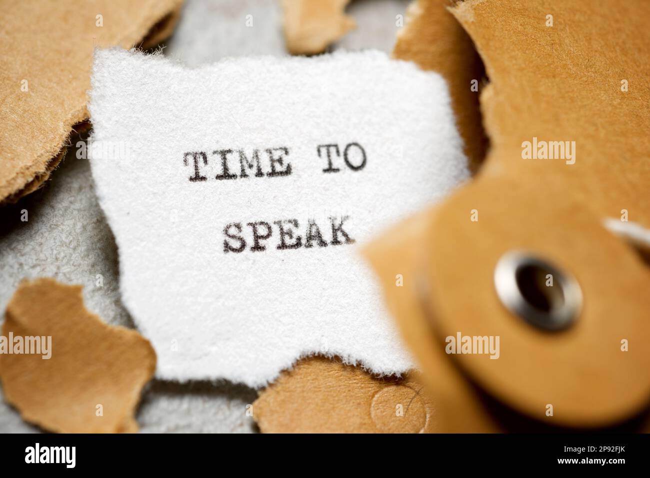 Time to speak text written on a small piece of paper Stock Photo - Alamy