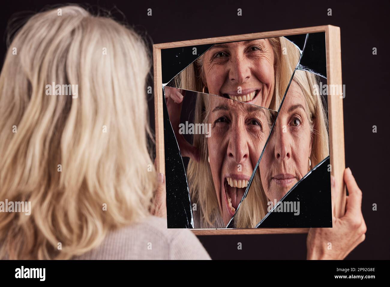 Bipolar woman, broken mirror or reflection of anxiety, depression or ...