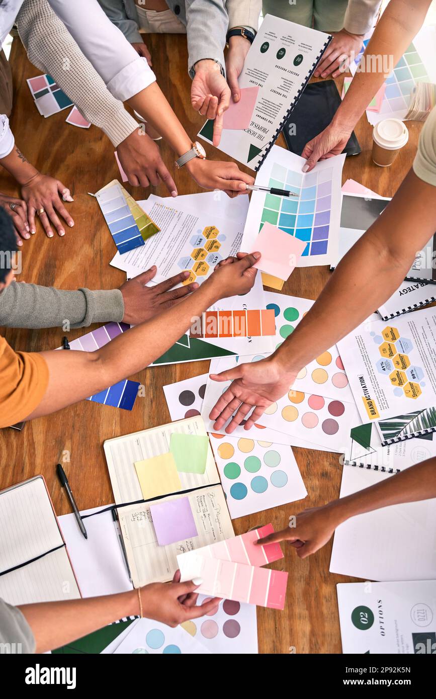 Color, design palette and hands of business people on desk for branding ...