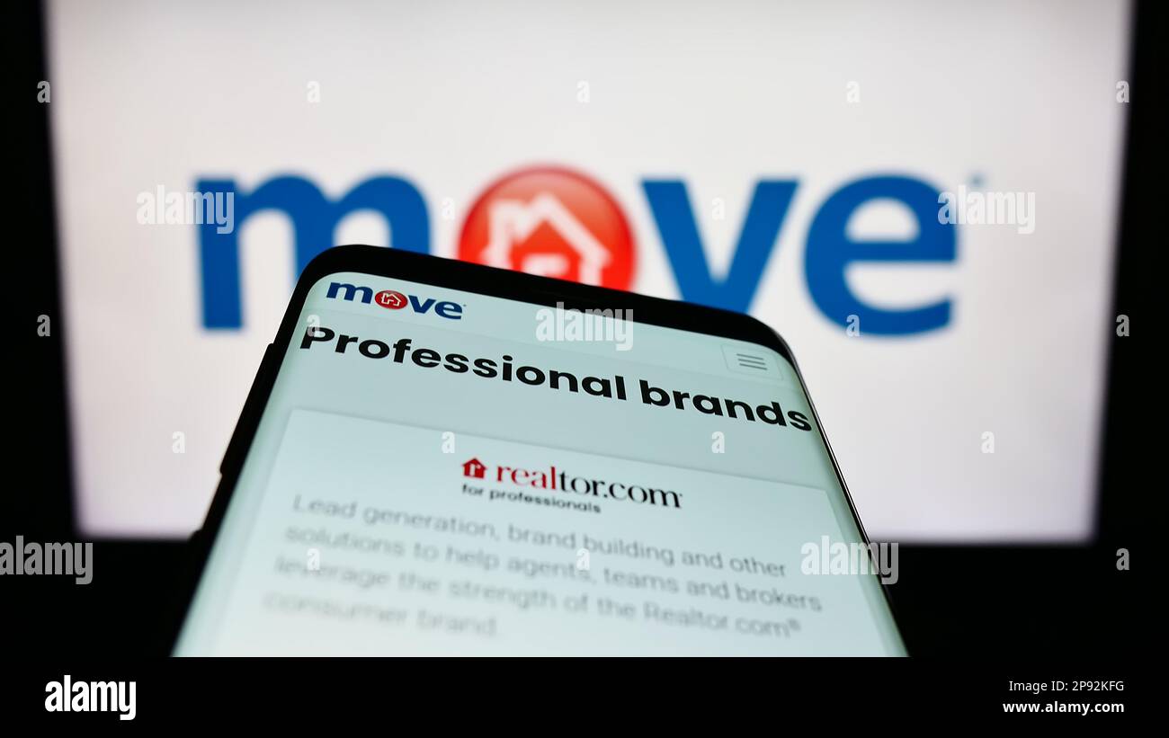 Smartphone with website of US real estate company Move Inc. on screen ...