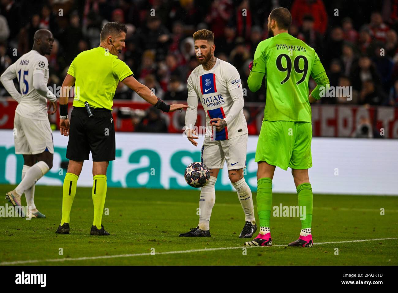 Munich, 8. March 2023, Referee Daniele Orsato, #4 Sergio Ramos PSG, #99 GK Gianluigi Donnarumma ...