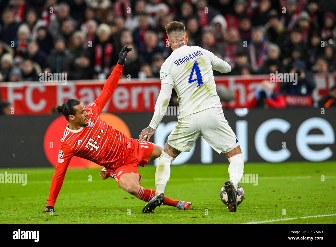 Munich, 8. March 2023, #10 Leroy Sané FCB, #4 Sergio Ramos PSG ...