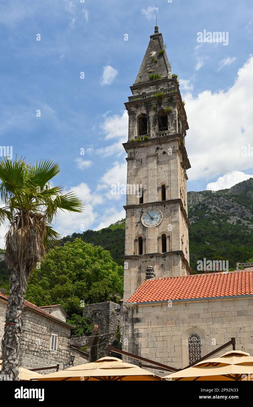 The beautiful church of St. Nicholas with a tall belfry. Perast ...