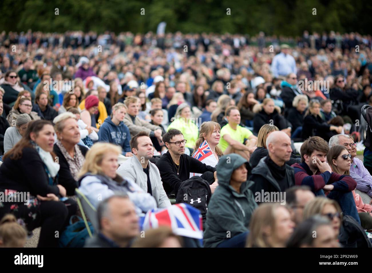 People watch the TV coverage of the late Queen Elizabeth II’s funeral ...