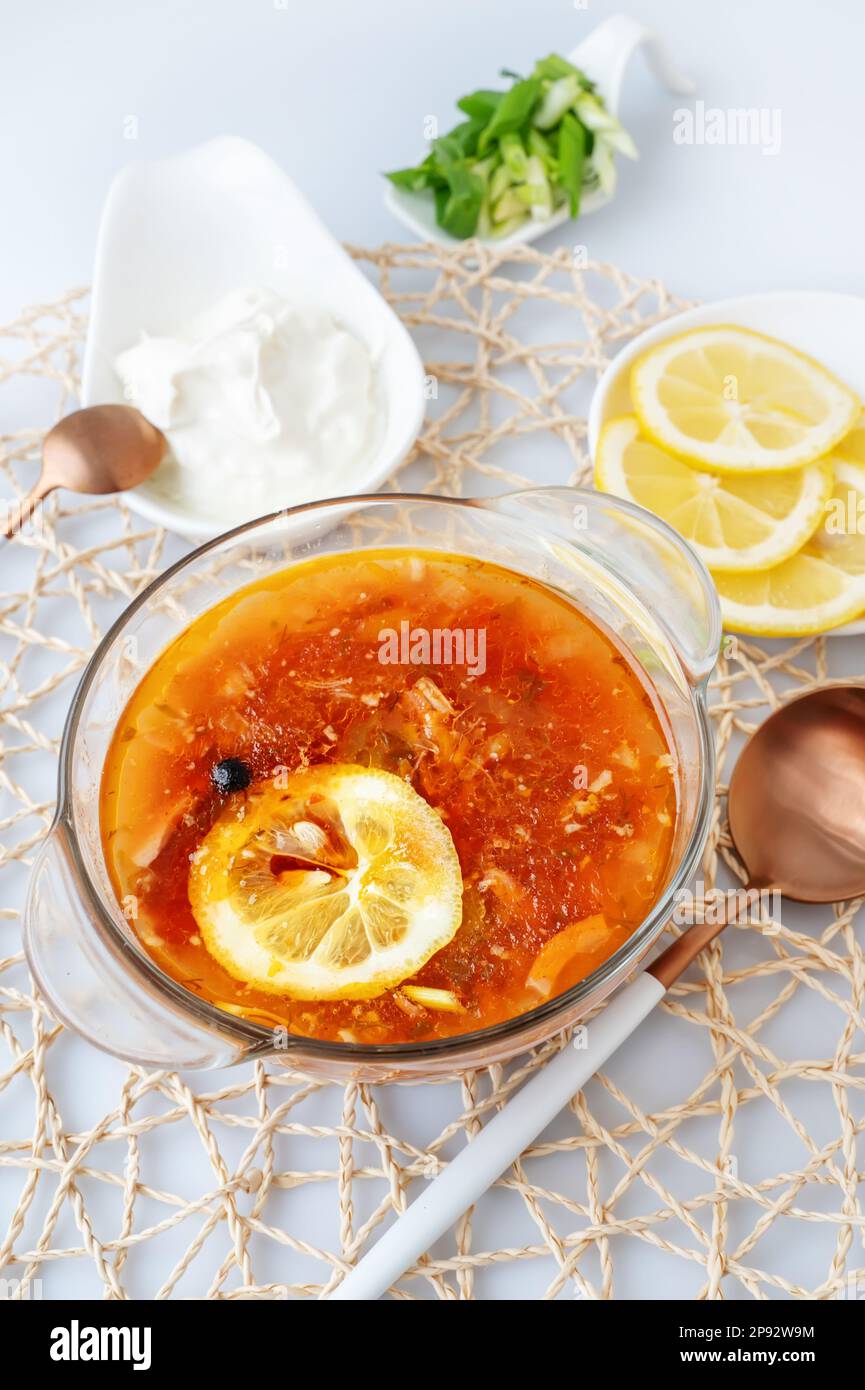 Meat Solyanka. combined solyanka. a portion of spicy red meat soup with ...