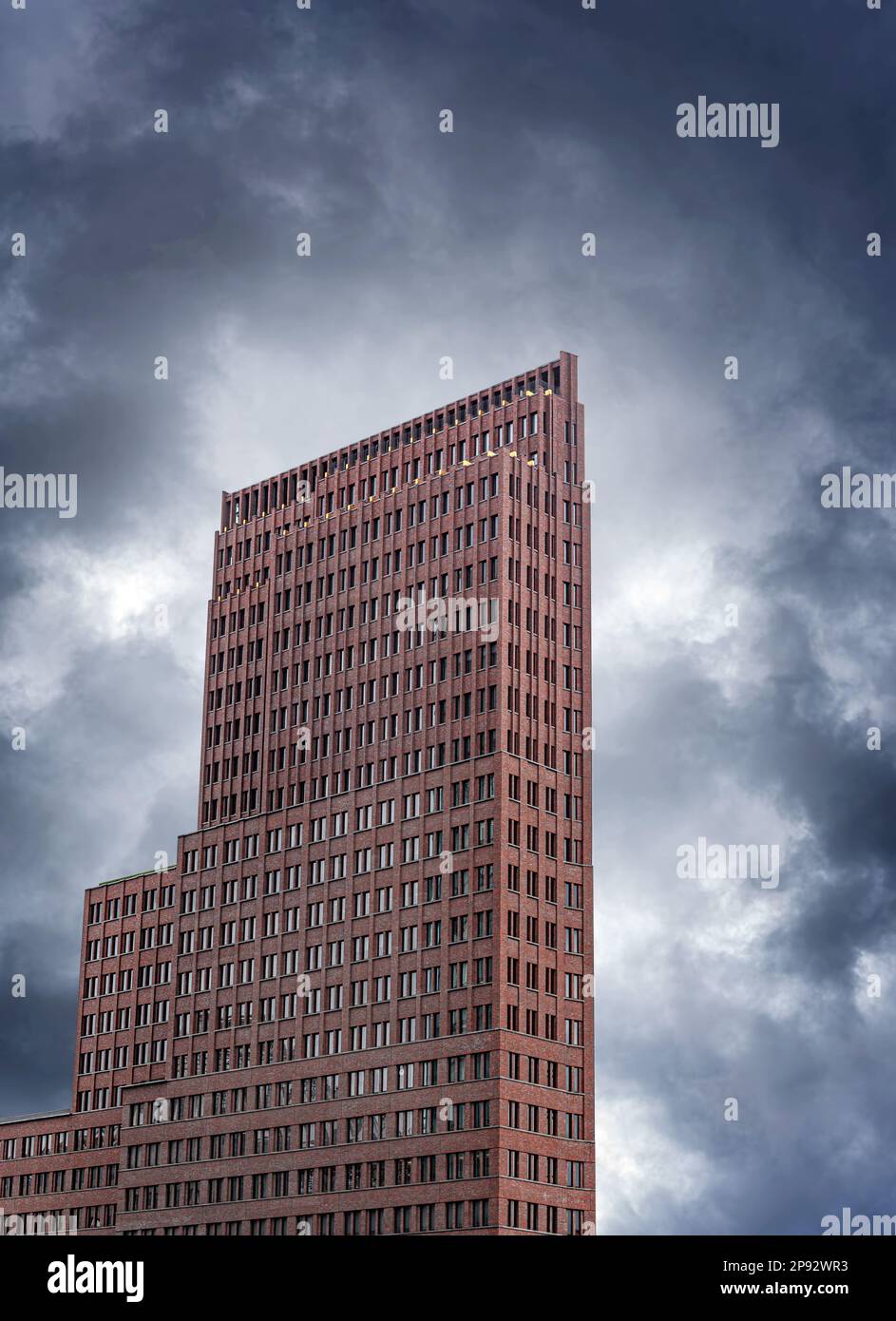Building under the dark storm clouds Stock Photo - Alamy
