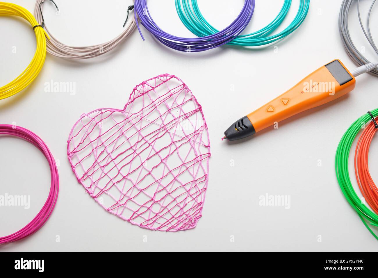 3d Pen. Printing with Colored Plastic Wire Filament. Child making a ...