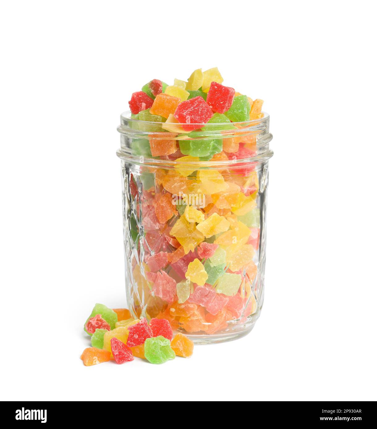 Mix of delicious candied fruits in jar on white background Stock Photo ...