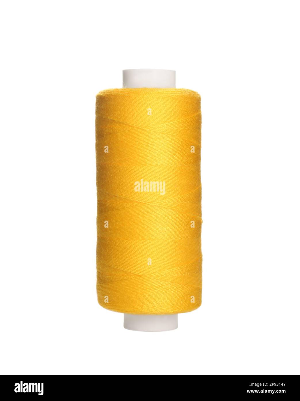 Spool of yellow sewing thread isolated on white Stock Photo - Alamy