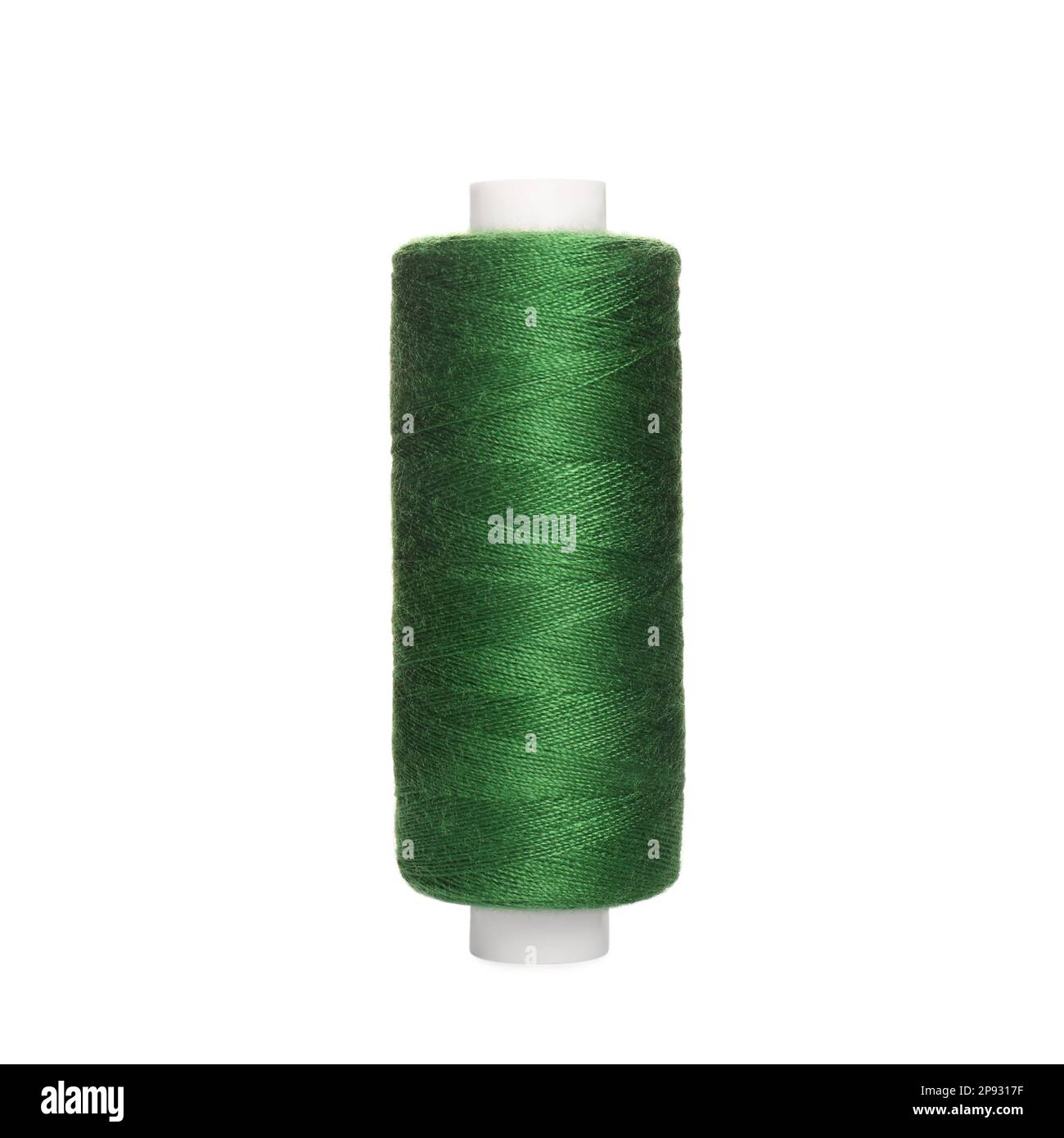Spool of green sewing thread isolated on white Stock Photo - Alamy