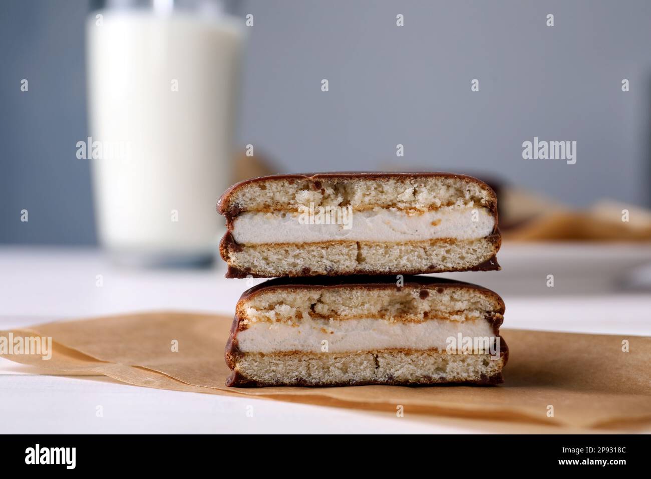 Tasty choco pies on parchment paper, closeup view Stock Photo - Alamy
