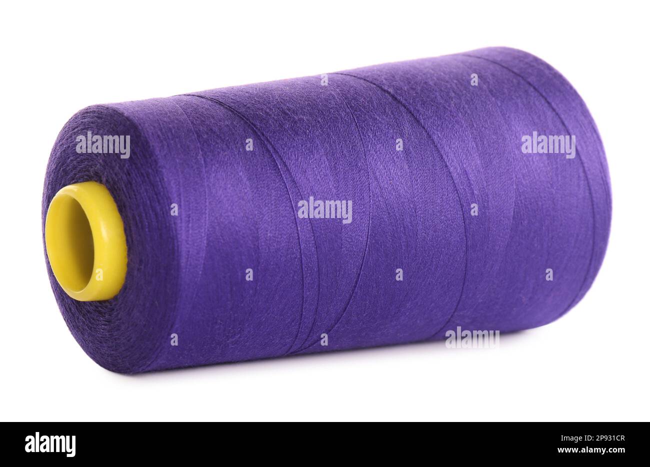 Spool of purple sewing thread isolated on white Stock Photo - Alamy