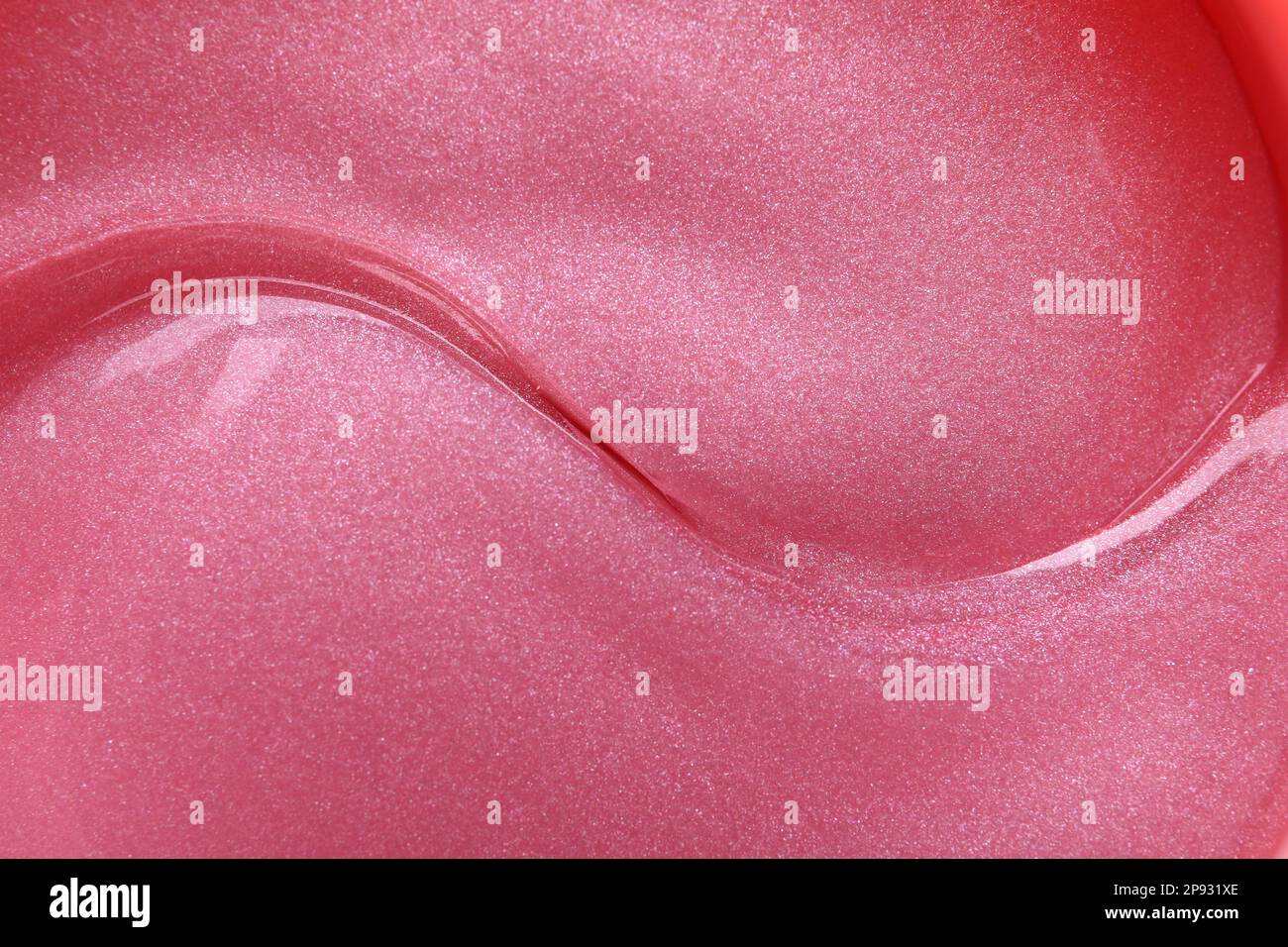 Shiny pink under eye patches as background, closeup. Cosmetic product ...