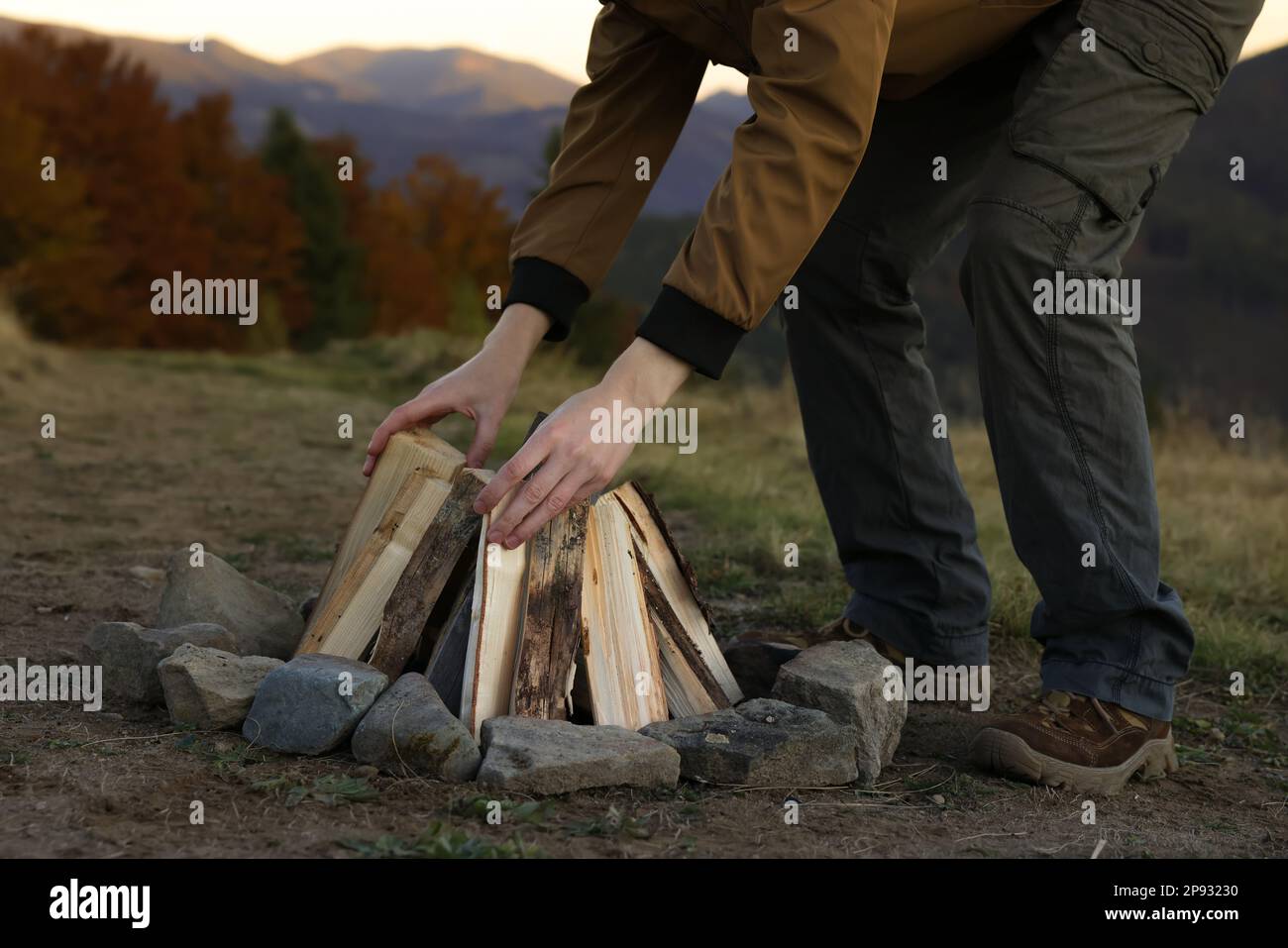 Person making bonfire hi-res stock photography and images - Alamy