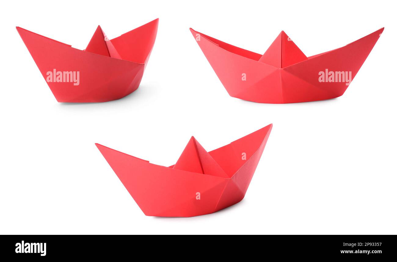 Set with red paper boats on white background Stock Photo - Alamy