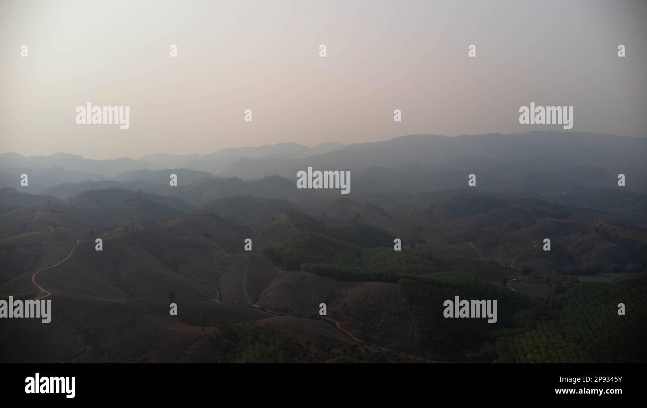 Mountain destroyed by human for cultivate plants. Aerial view of ...