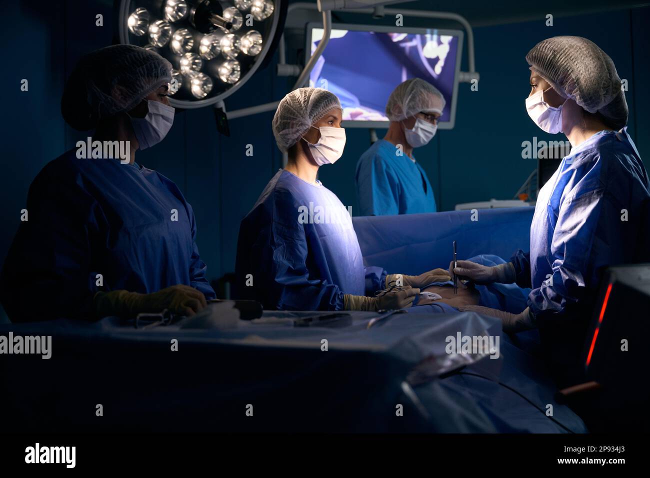 Patient lies on operating table hi-res stock photography and images - Alamy