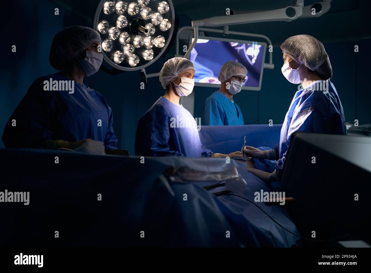 Man under anesthesia lies on the operating table Stock Photo - Alamy