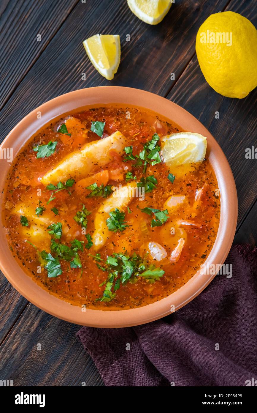 Psarosoupa traditional greek fish and vegetable soup Stock Photo - Alamy