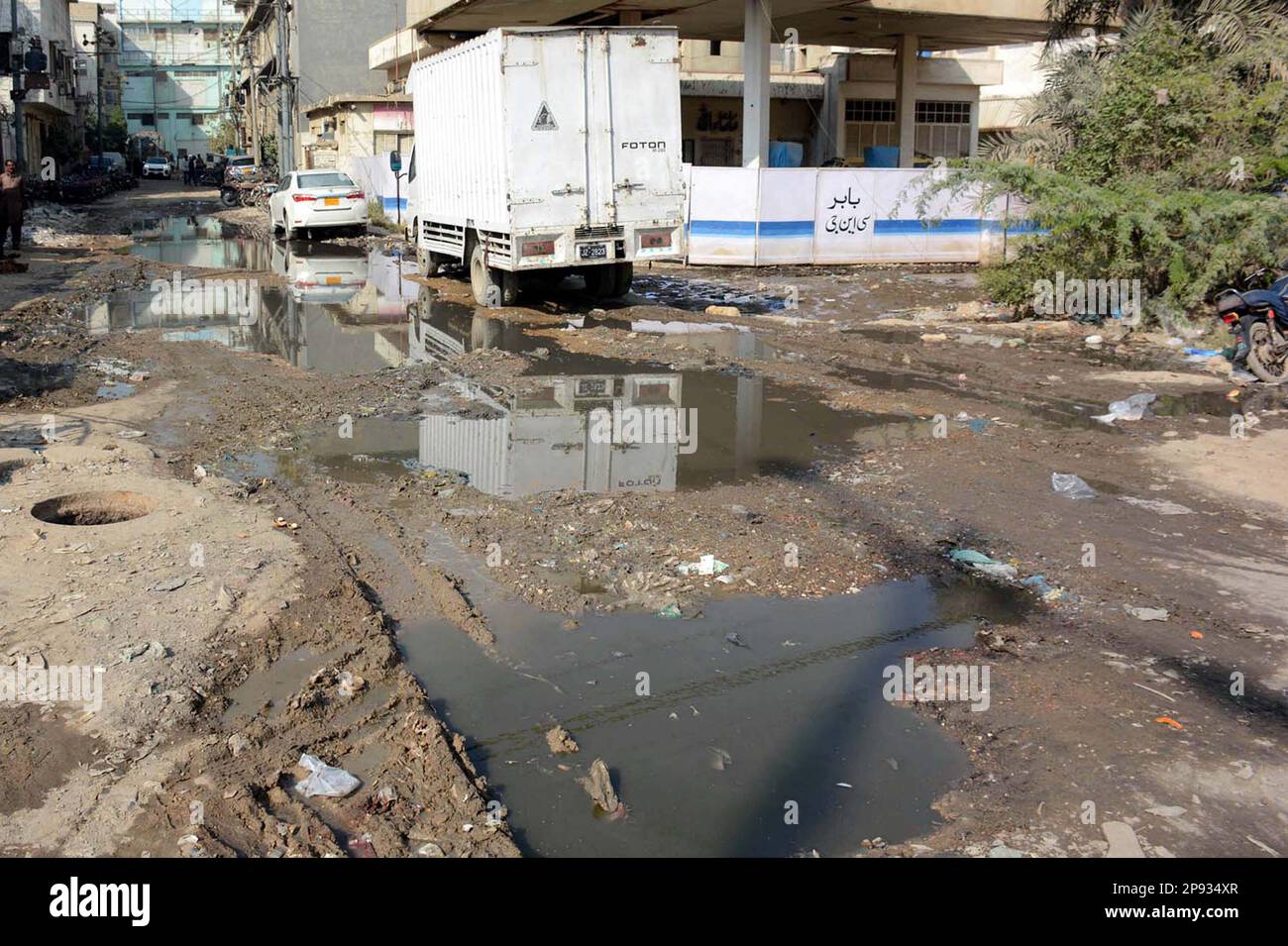 Inundated road by overflowing sewerage water, creating problems for ...