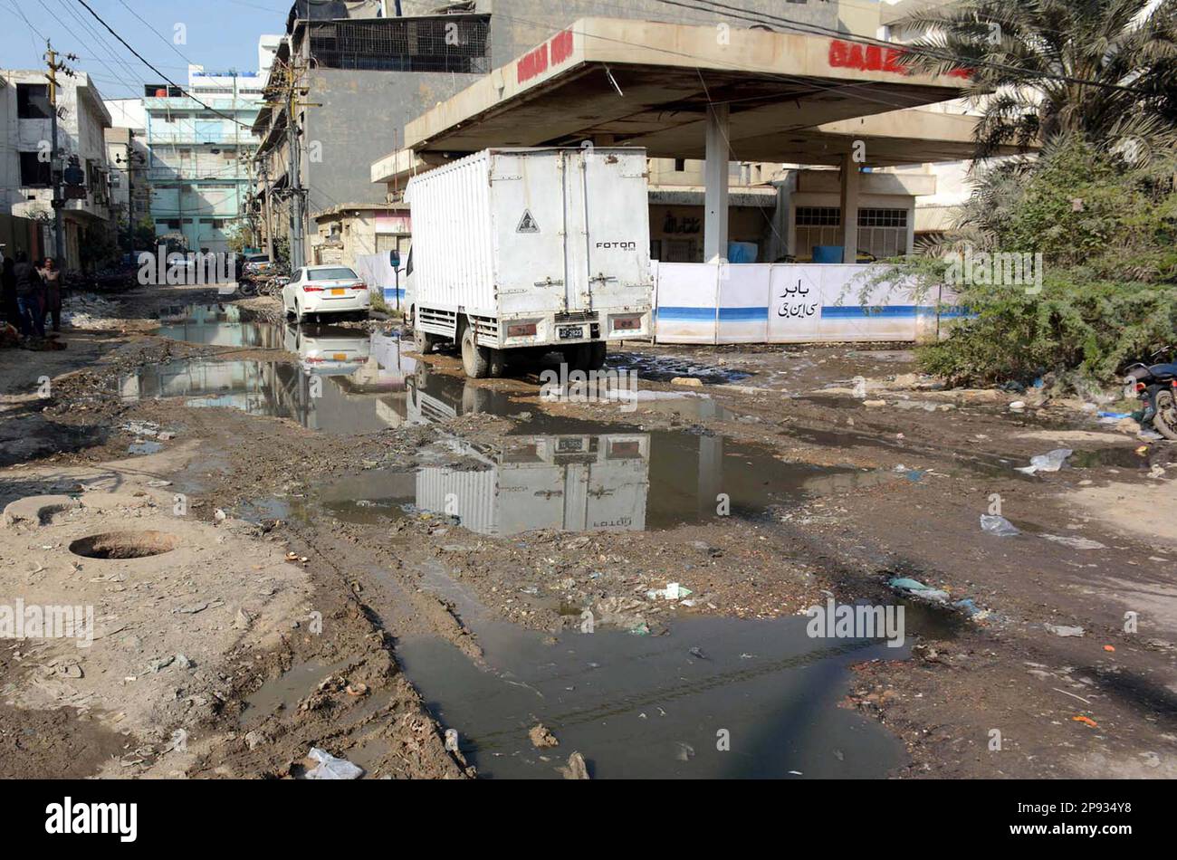Inundated road by overflowing sewerage water, creating problems for ...
