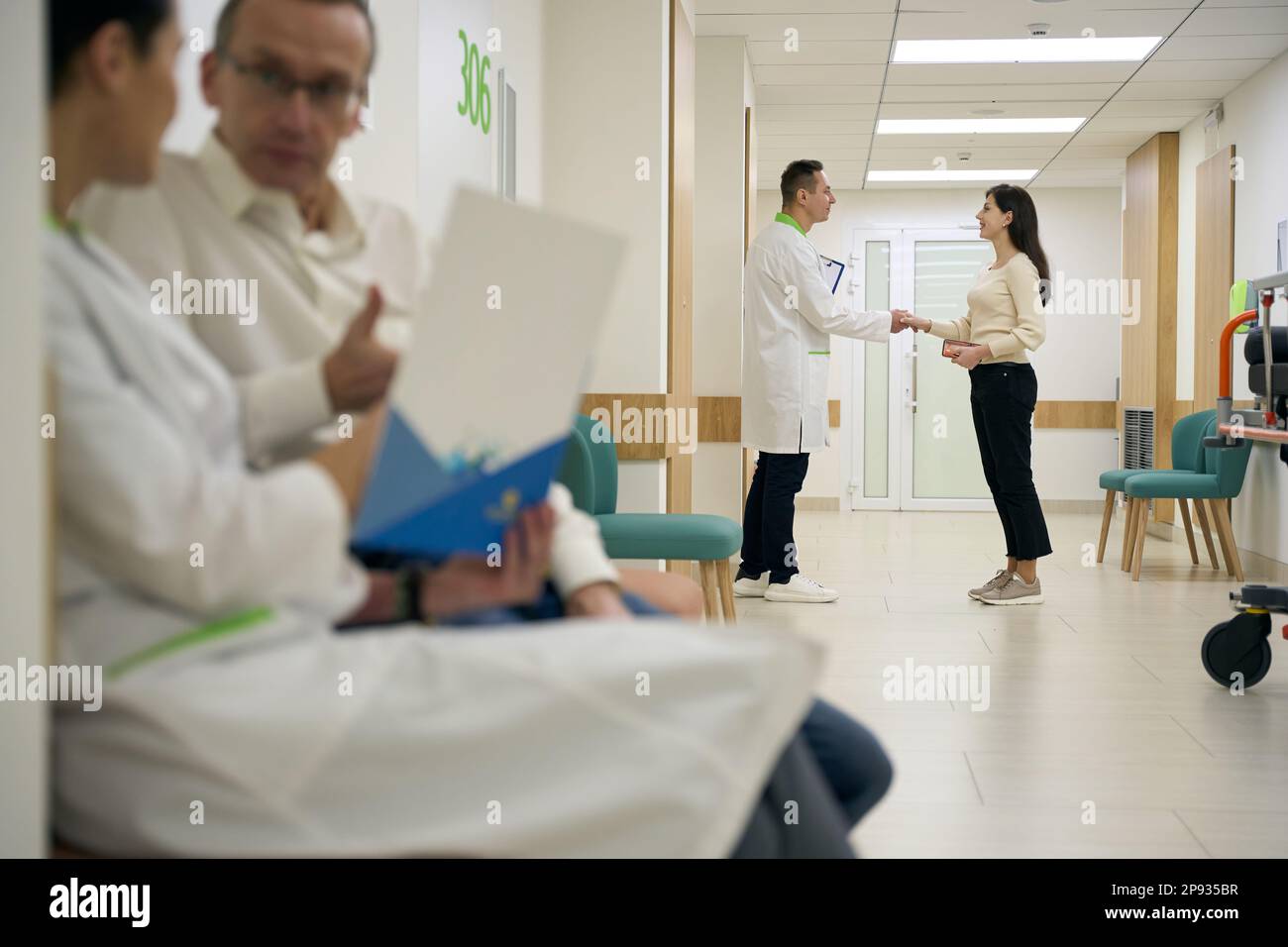 Handshake between nurse doctor hi-res stock photography and images - Alamy