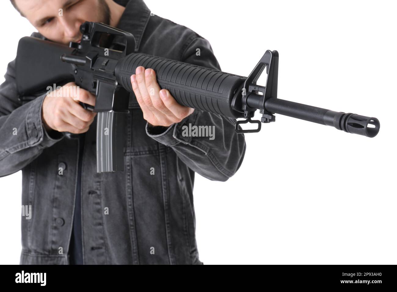 Assault gun. Man aiming rifle against white background, focus on barrel ...