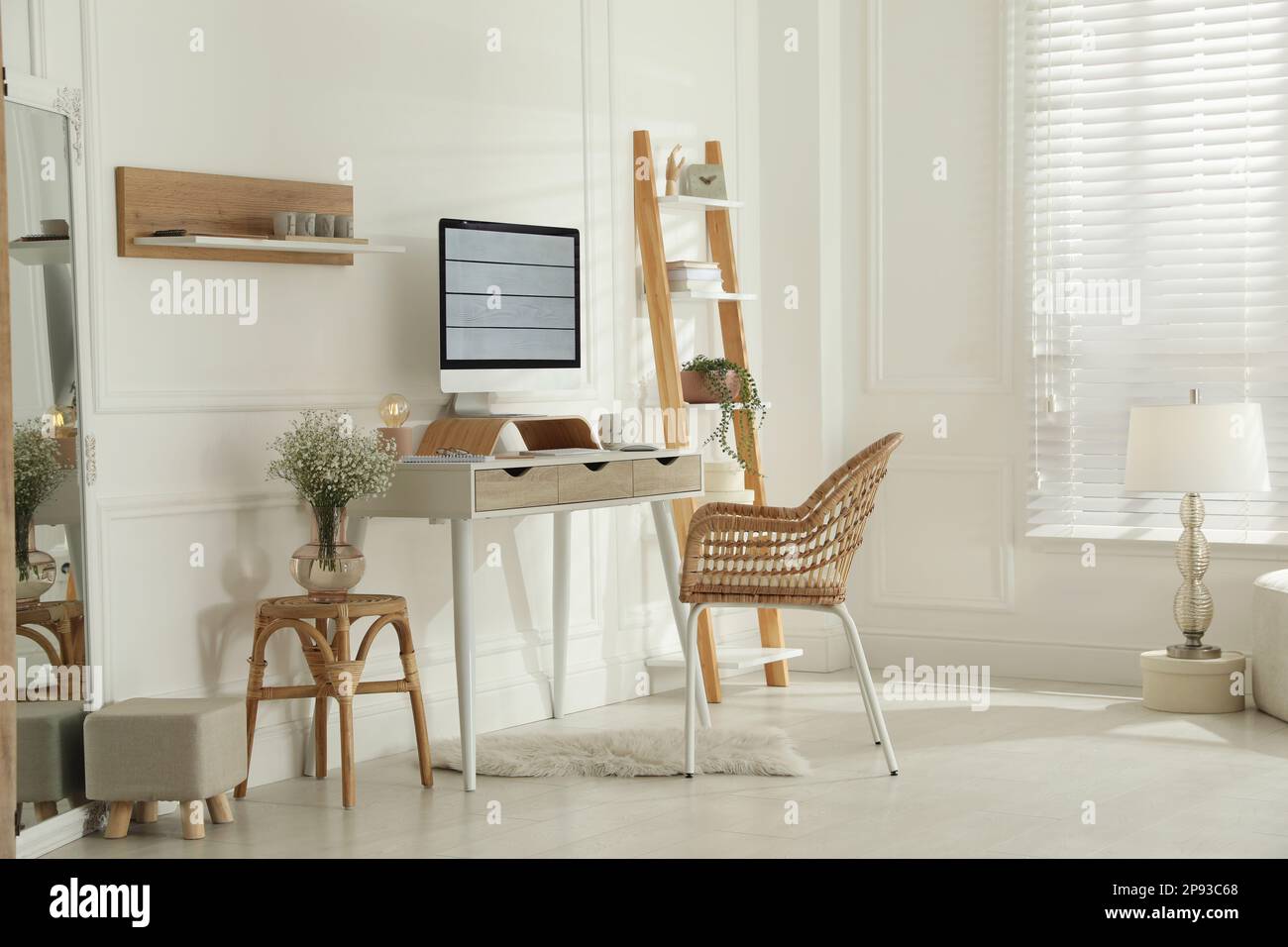 Comfortable workplace with modern computer and lamp in room. Interior ...