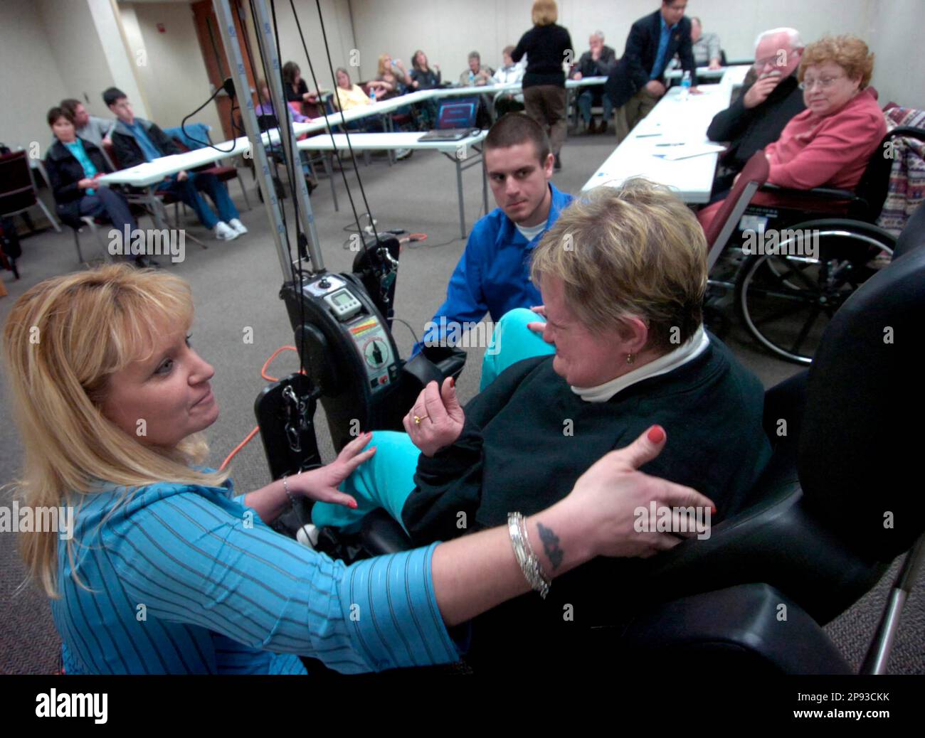 Gina, left, and Justin Gilligan demonstrate the Quadriciser, an ...