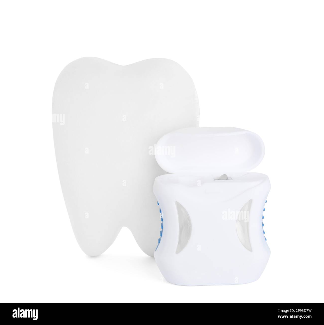 Tooth shaped holder and dental floss on white background Stock Photo ...