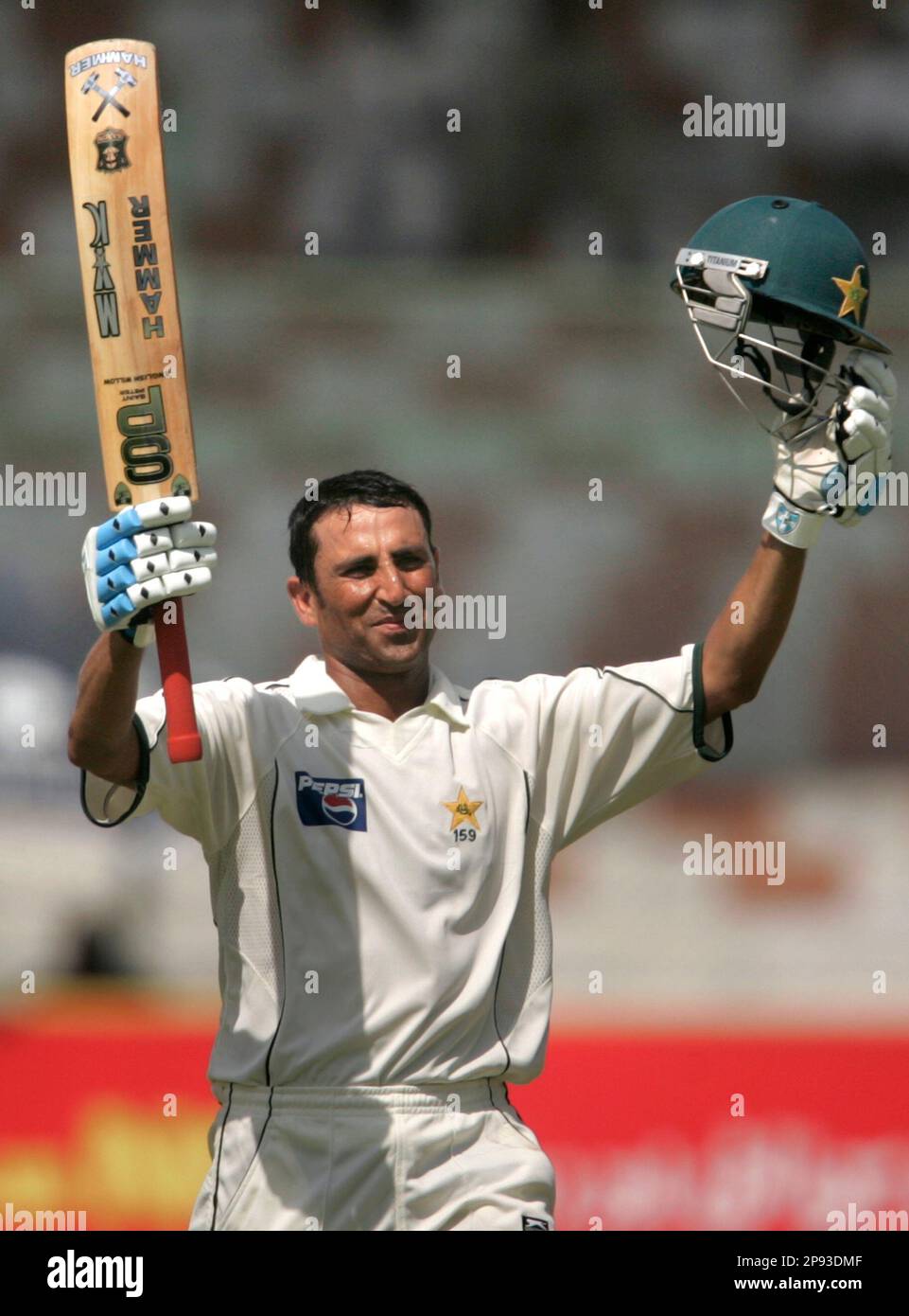 Pakistani batsman Younis Khan celebrates after completing his double ...