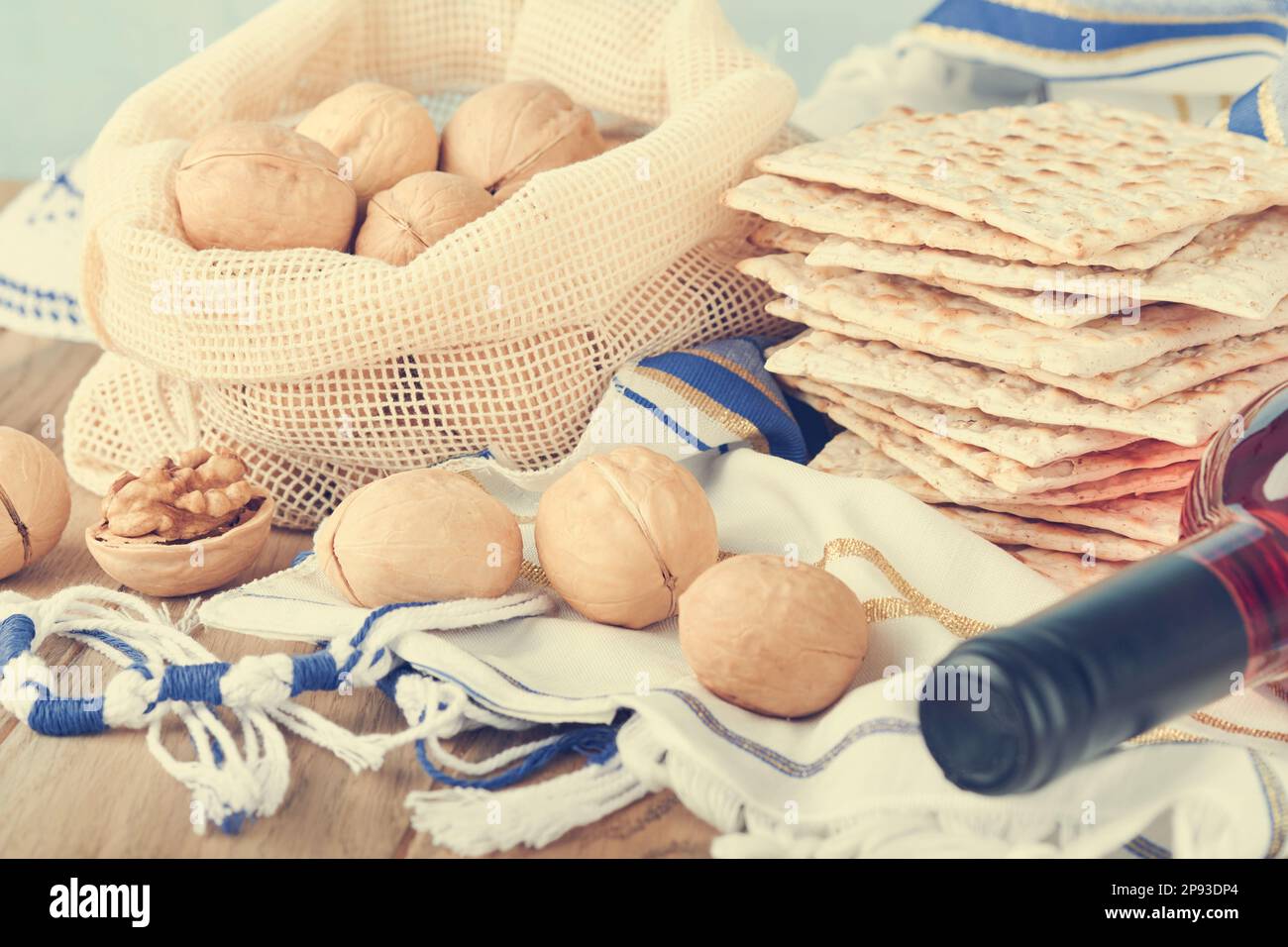 Passover celebration concept. Matzah, red kosher and walnut ...