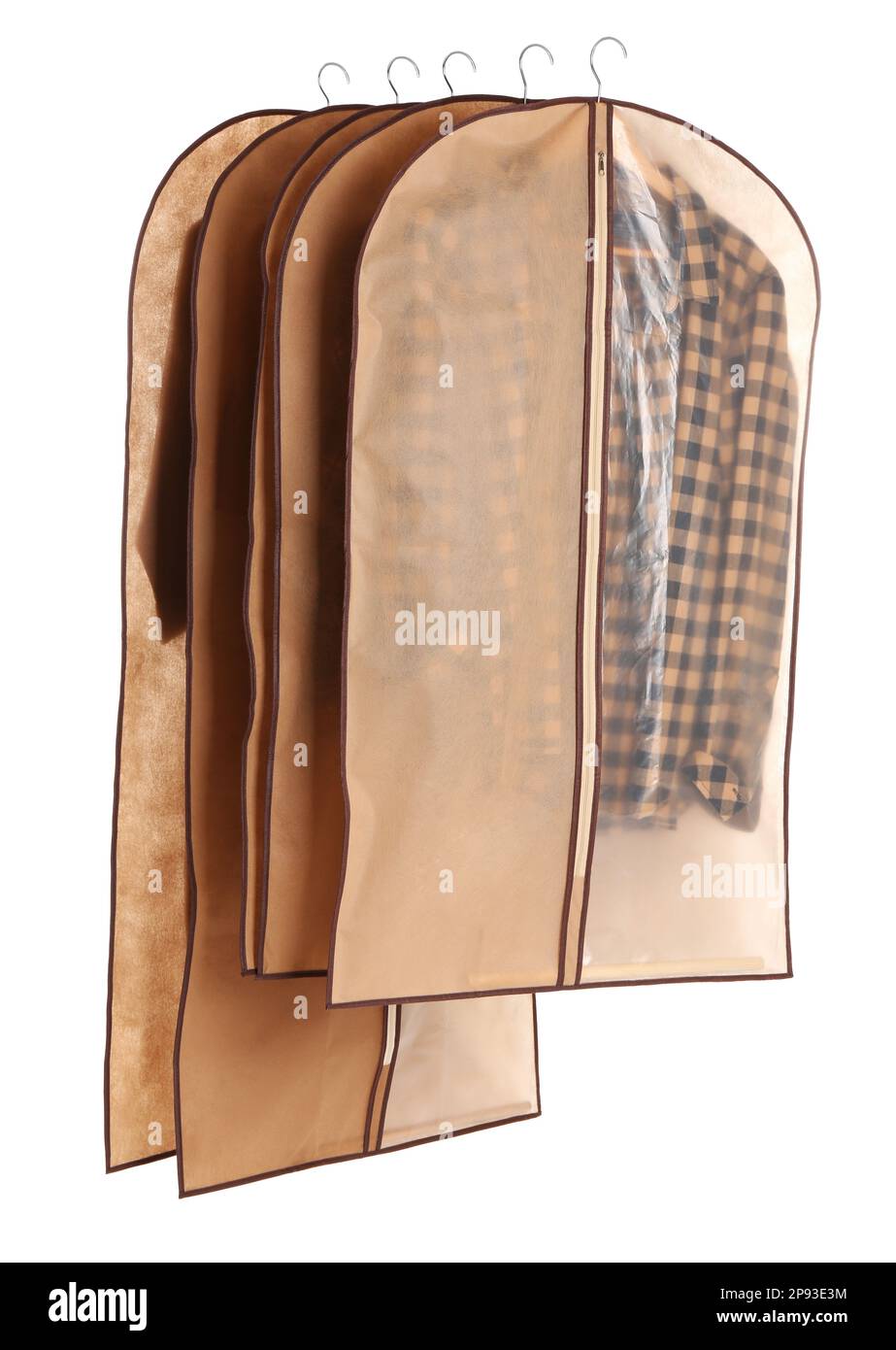 Garment bags with clothes on white background Stock Photo - Alamy