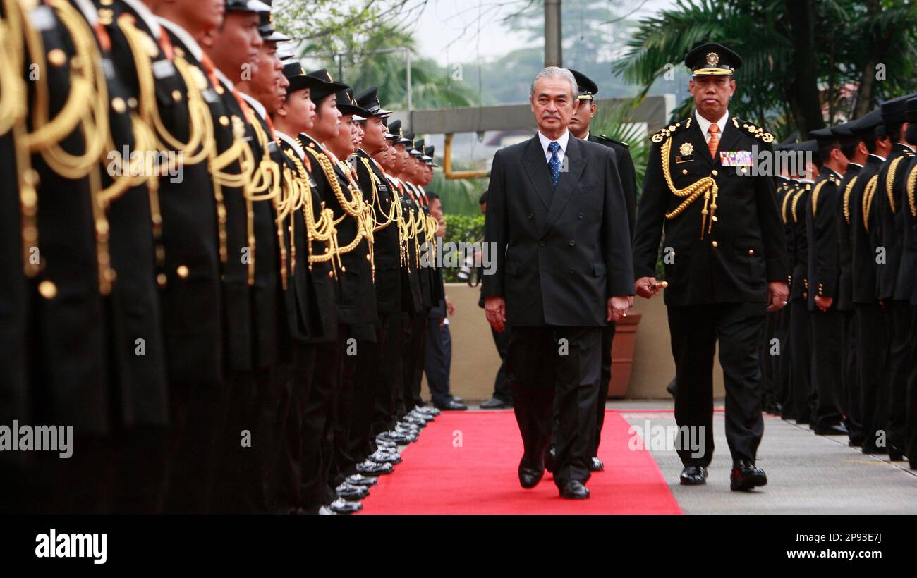 Malaysian Prime Minister Abdullah Ahmad Badawi, center, inspects ...