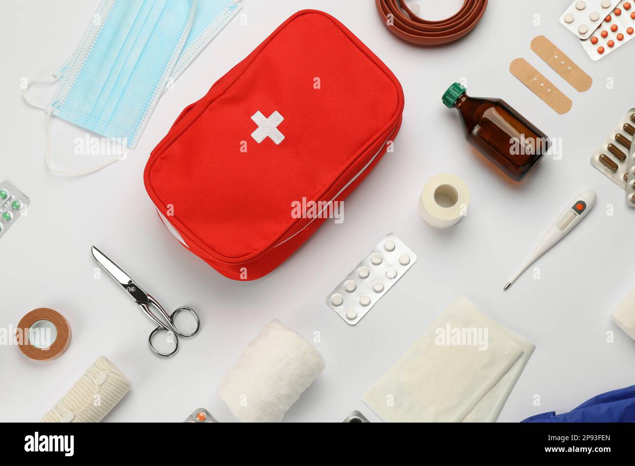 Flat lay composition with first aid kit on white background Stock Photo ...