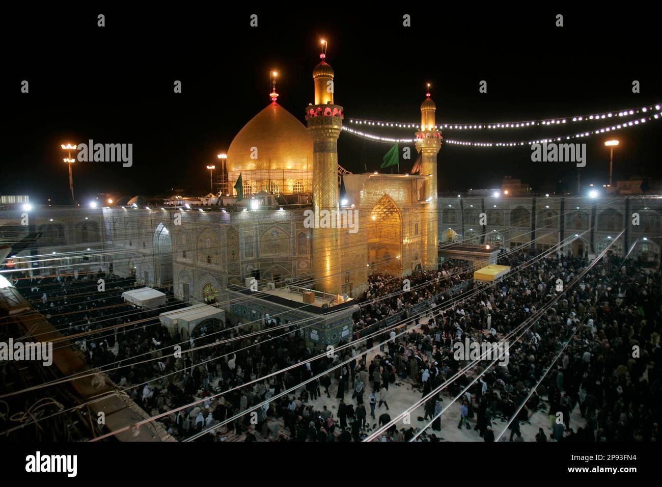 Pilgrims visit the shrine of Imam Ali in the holy Shiite city of Najaf ...