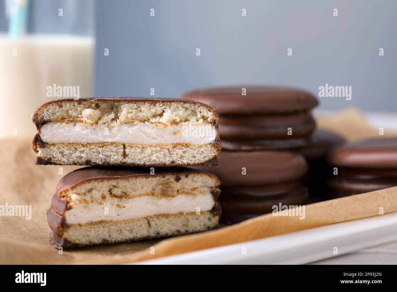 Tasty choco pies on parchment paper, closeup view Stock Photo - Alamy