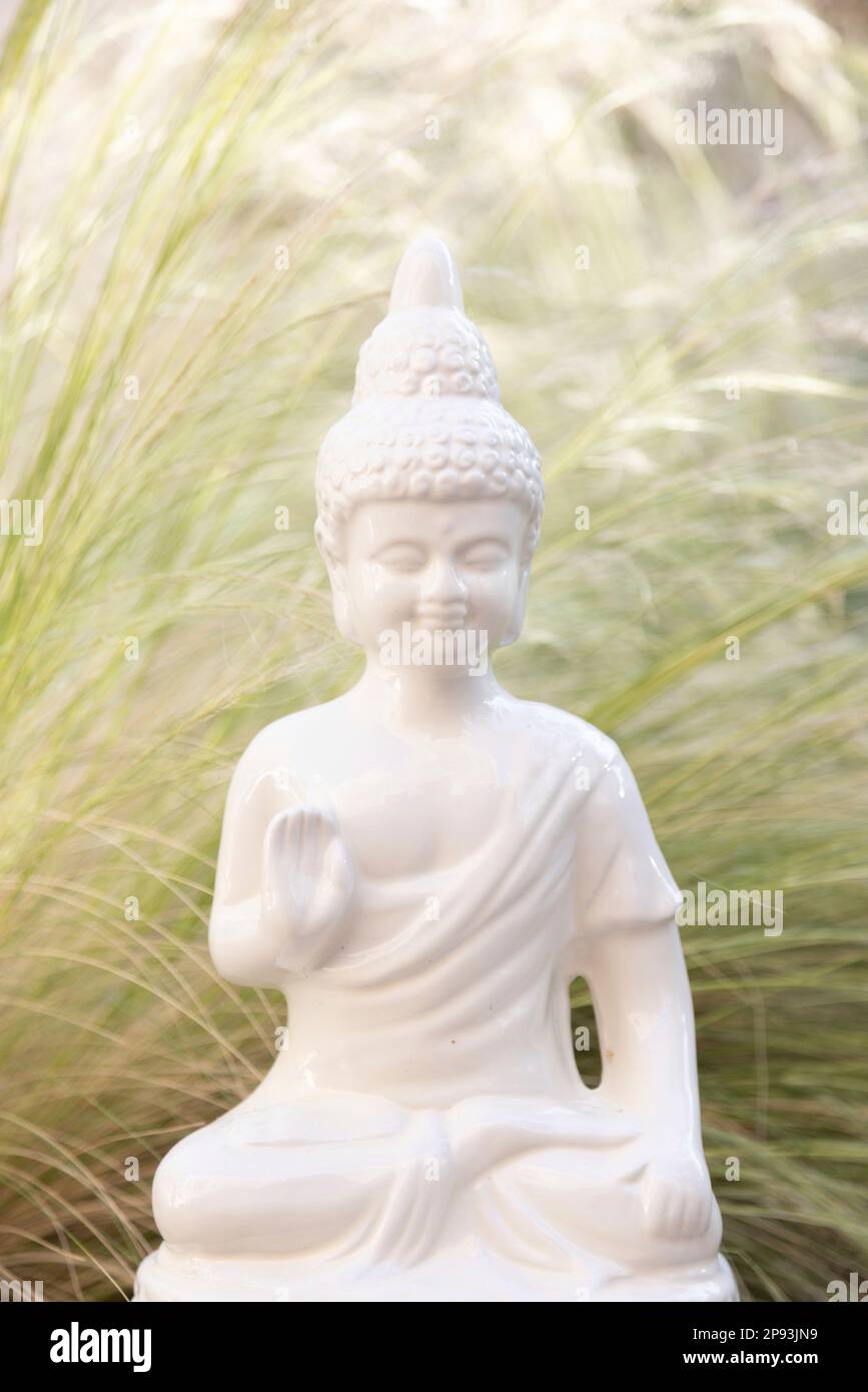 Sitting Buddha figure outdoor Stock Photo - Alamy