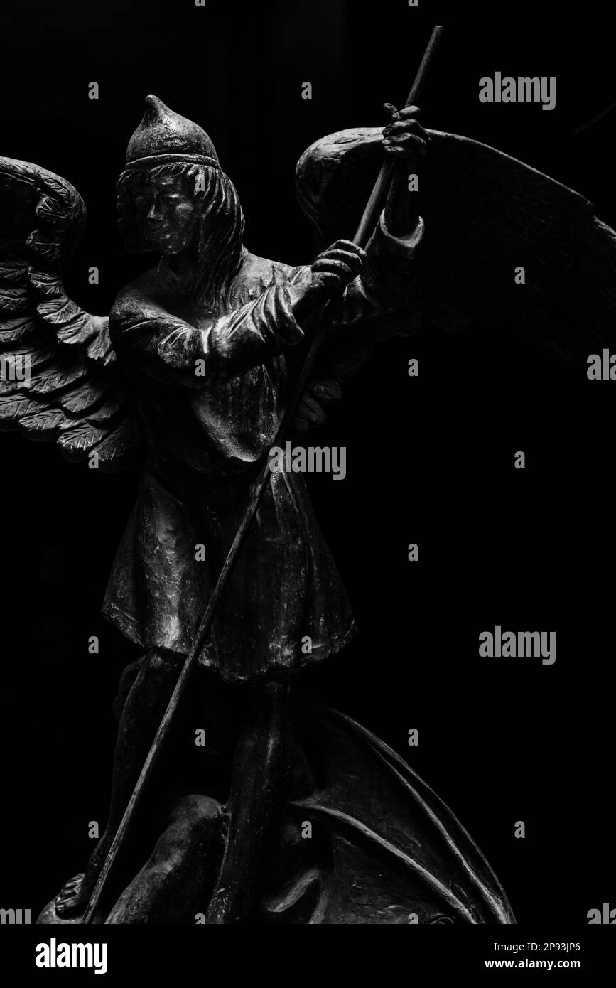 Metal sculpture of an angel with a lance in Mallorca Stock Photo - Alamy