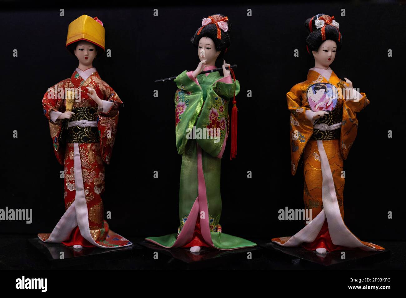 Three Japanese women figures in kimono Stock Photo - Alamy