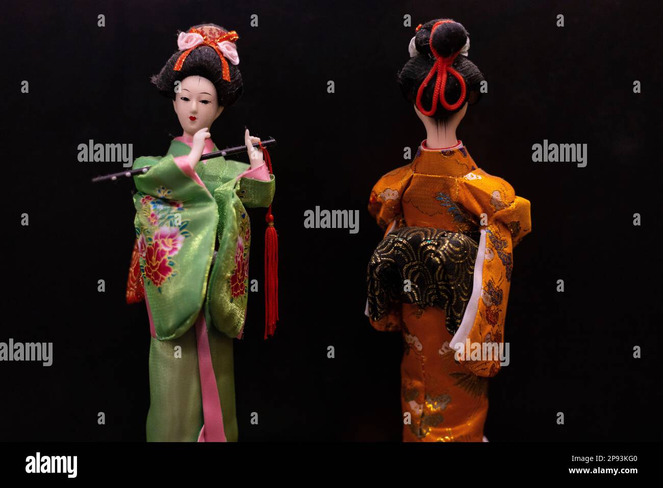 Two Japanese women figures side by side Stock Photo - Alamy