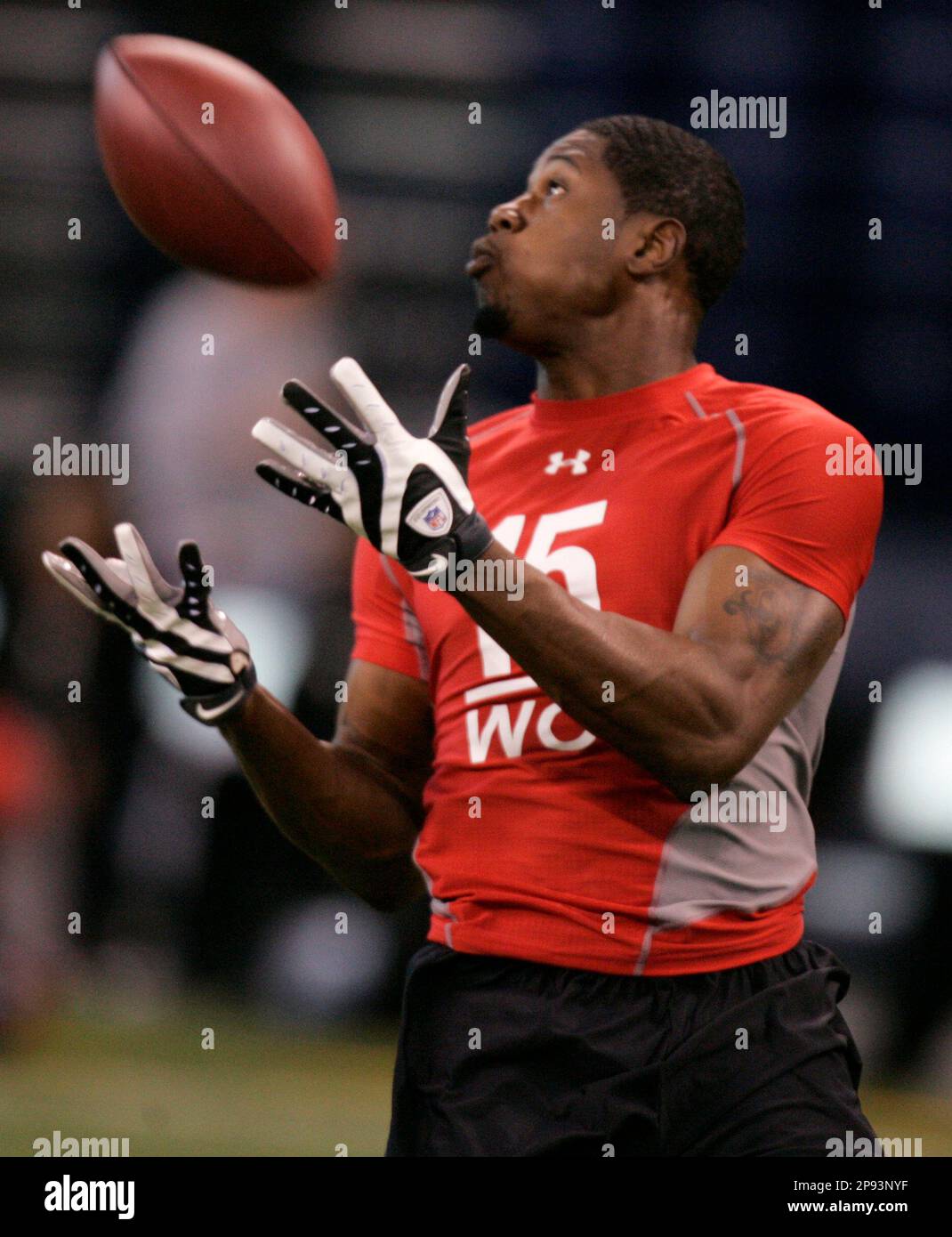 Rice receiver Jarett Dillard makes a catch during a football drill at ...