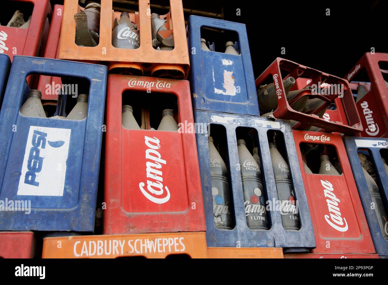 Crates of old bottles lie inside a section of the dilapidated Campa ...