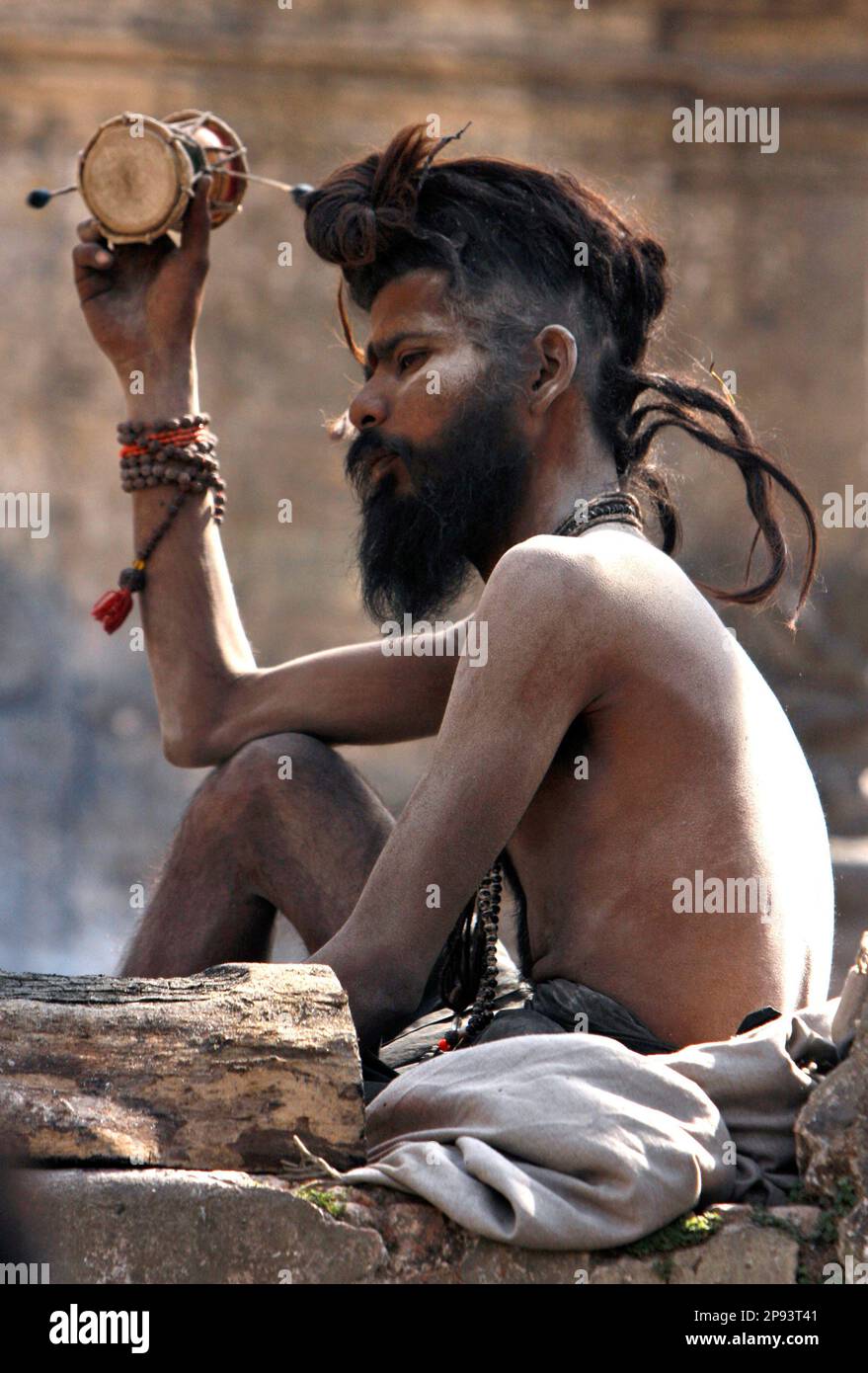 A Hindu holy man prays at Pasupatinath temple, a shrine of Shiva, the ...